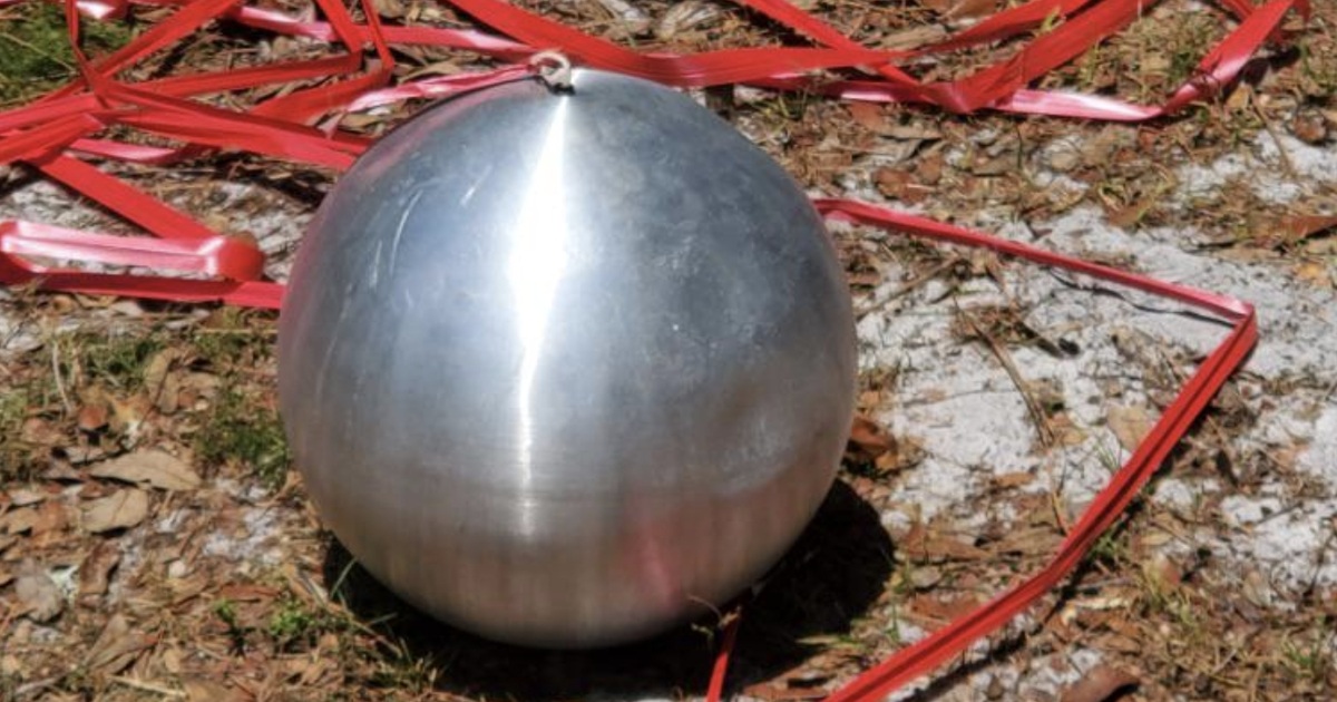 What That Strange Metallic Sphere in Your Field Really Is - Toptenplay